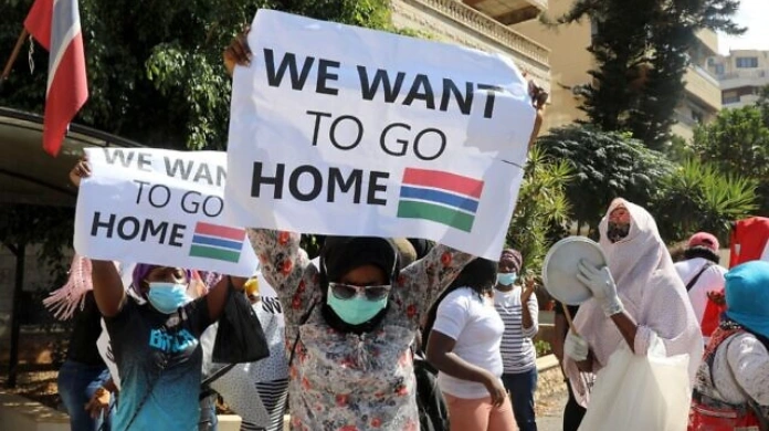 Modern Slavery in Plain Sight: The Kafala System and Migrant Rights in ...